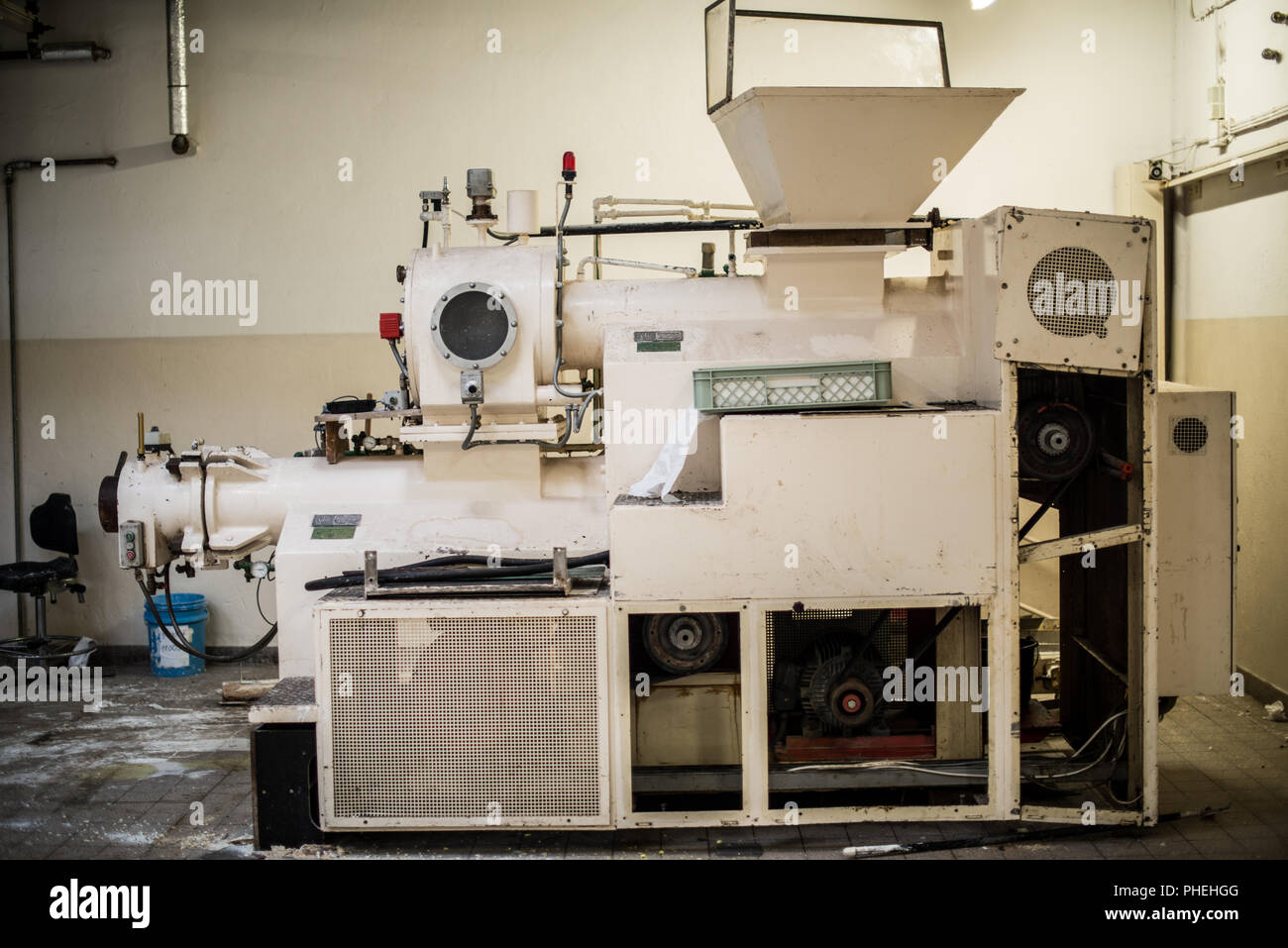 Mixing machine and press in soap production Stock Photo - Alamy