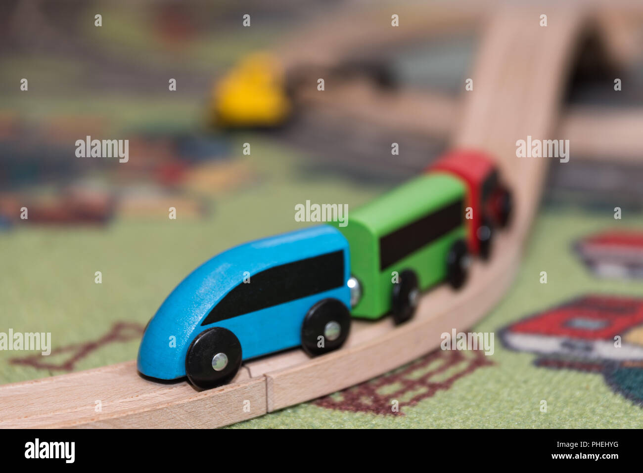 Colorful model train made of environmentally friendly wood - close-up ...