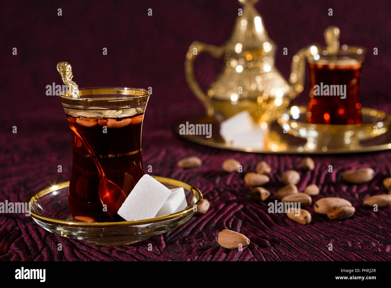 Tunisian tea in traditional glass Stock Photo - Alamy