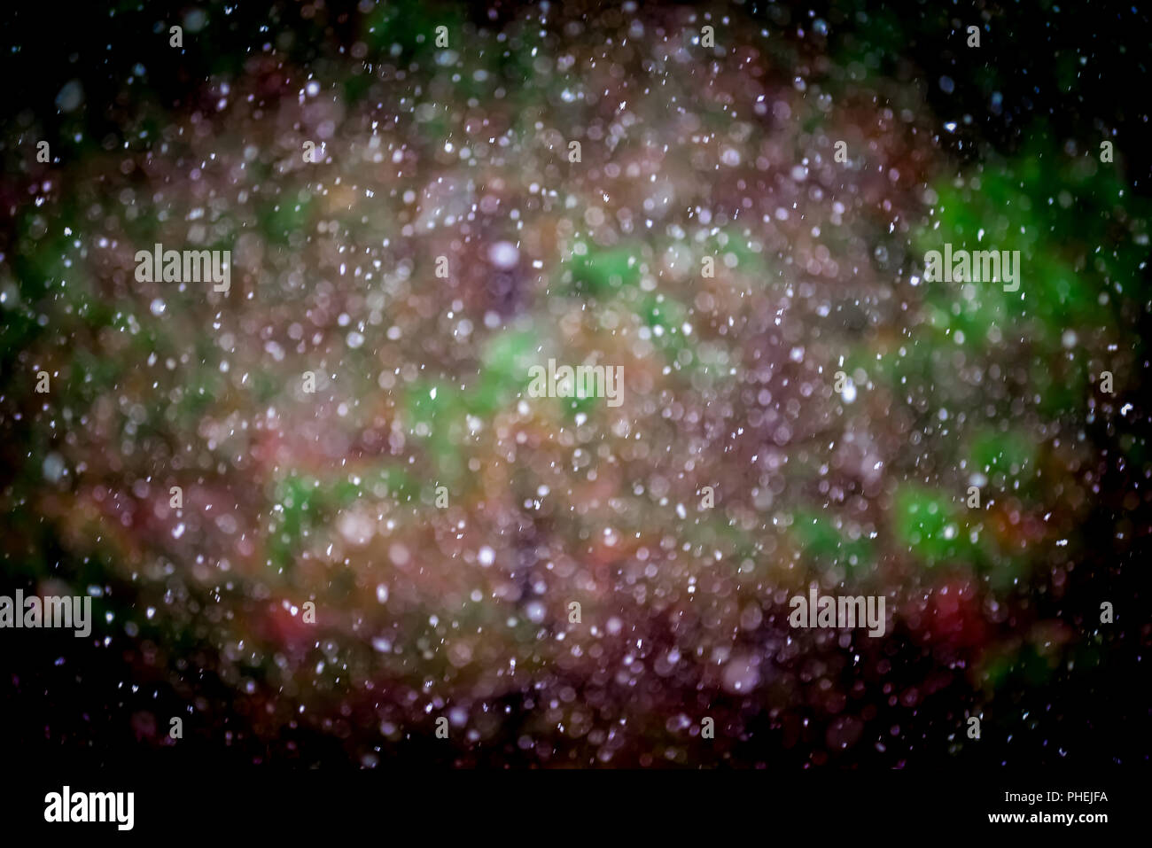 snow falling blur on forest background Stock Photo - Alamy