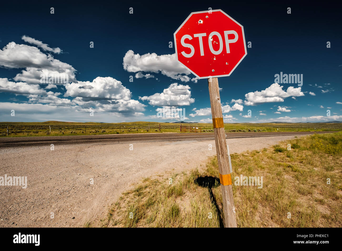 Stop sign with bullet holes hi-res stock photography and images - Alamy