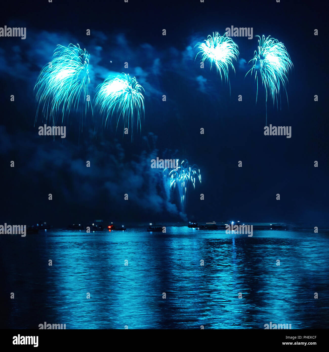 Blue holiday fireworks Stock Photo - Alamy