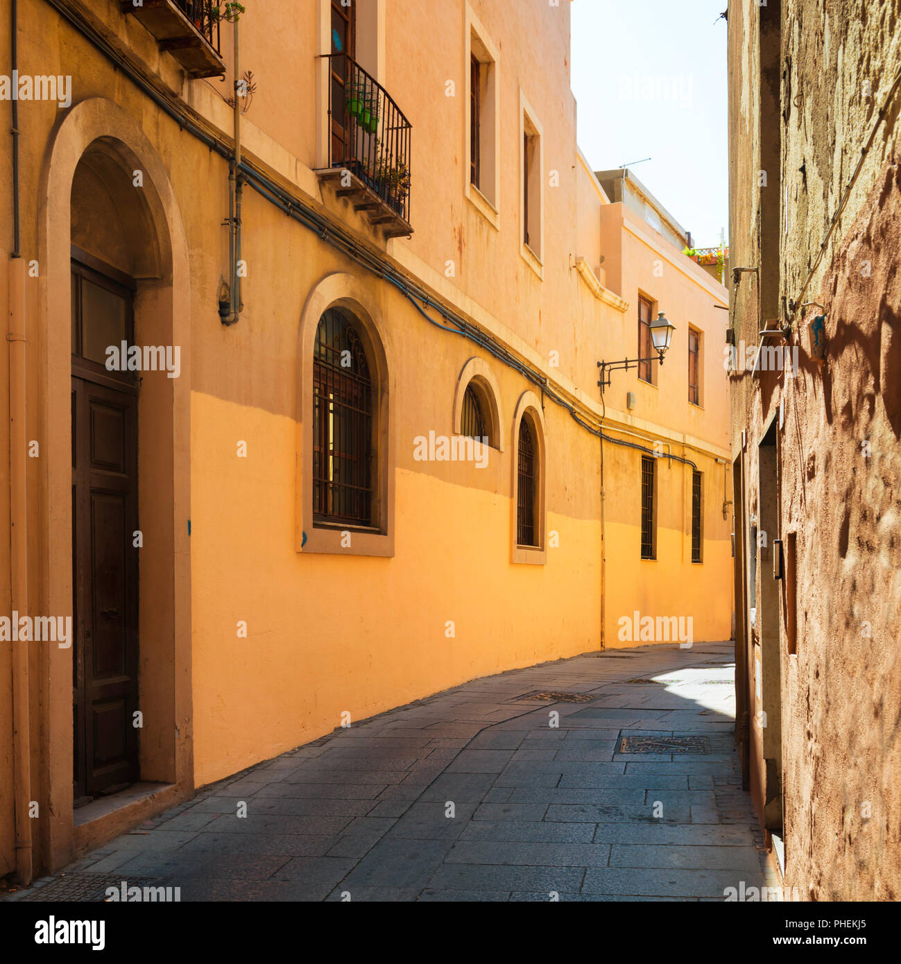 Cozy street in european city Stock Photo - Alamy