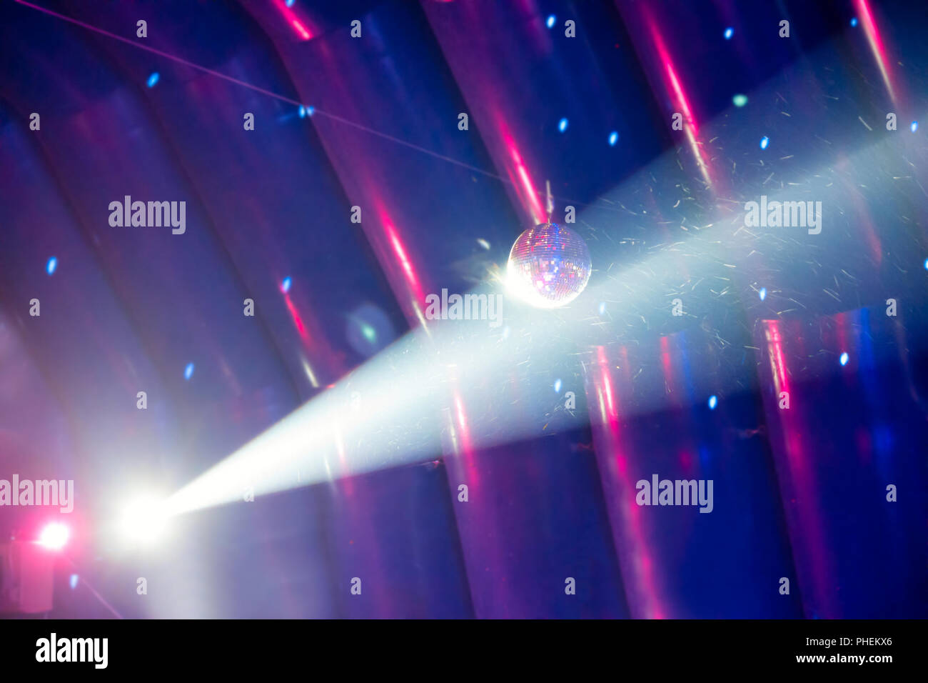 Disco ball and light ray Stock Photo - Alamy