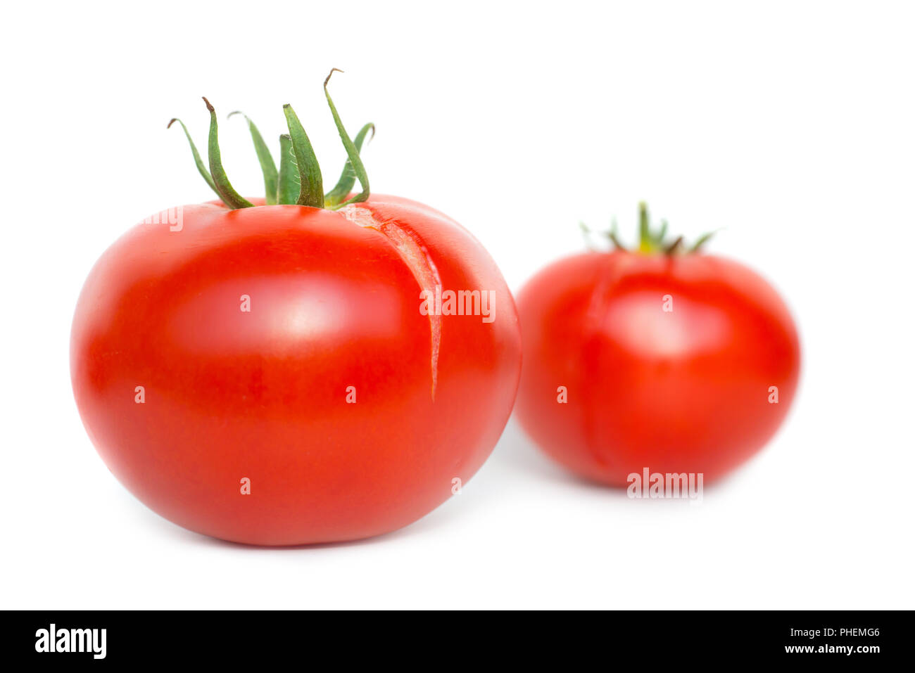 Two red fresh tomatoes Stock Photo - Alamy