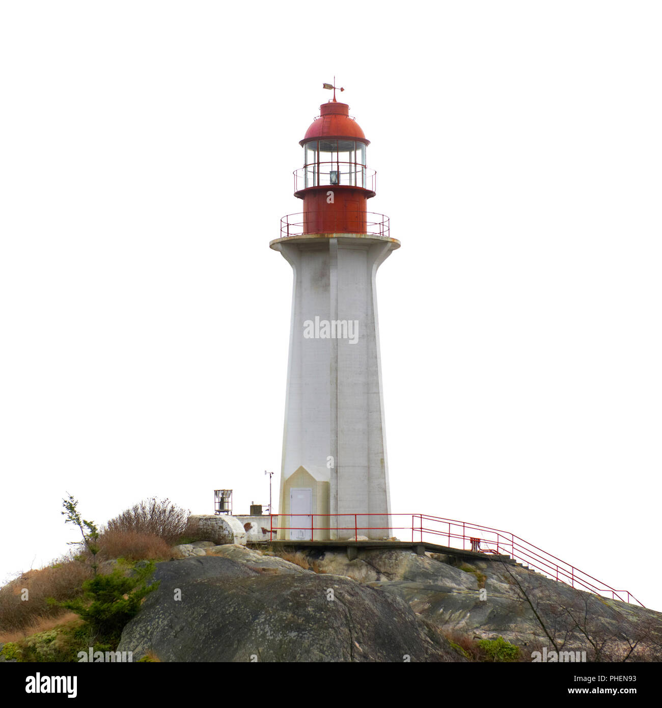 Lighthouse on the rock Stock Photo - Alamy