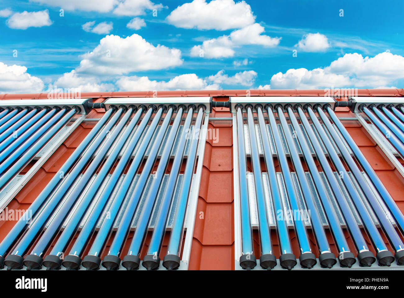 Vacuum collectors- solar water heating system Stock Photo - Alamy
