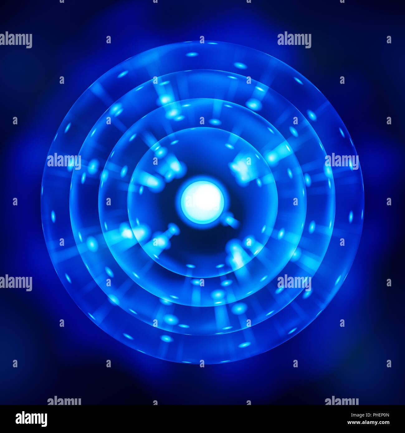 a stylized blue atom symbol Stock Photo - Alamy