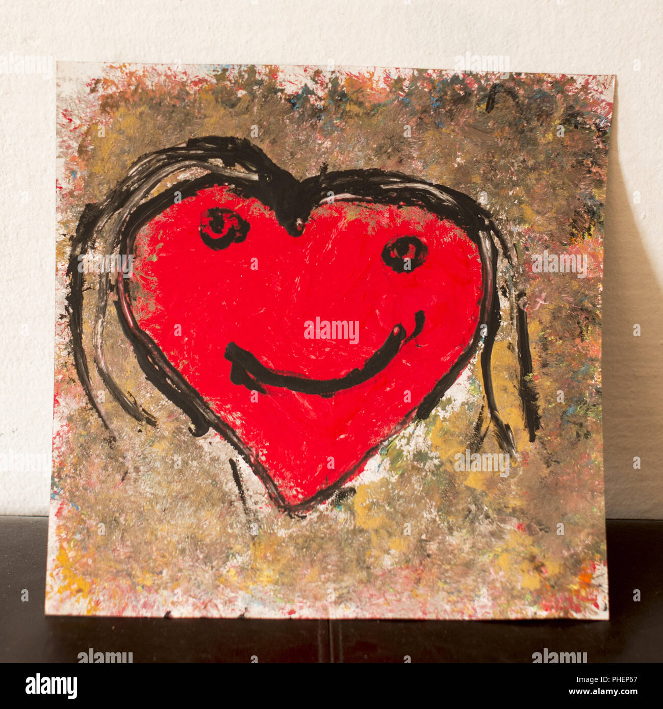 red heart with face Stock Photo - Alamy