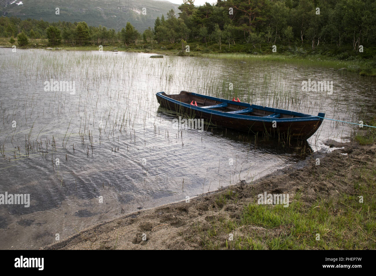 Rowing Boat in a Lake in Norway Stock Photo - Alamy