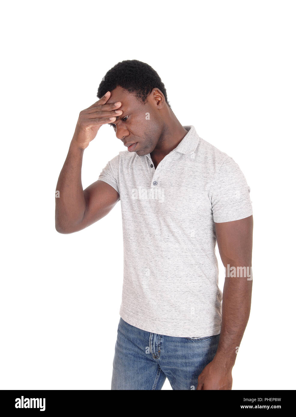 Depressed looking African man standing Stock Photo - Alamy