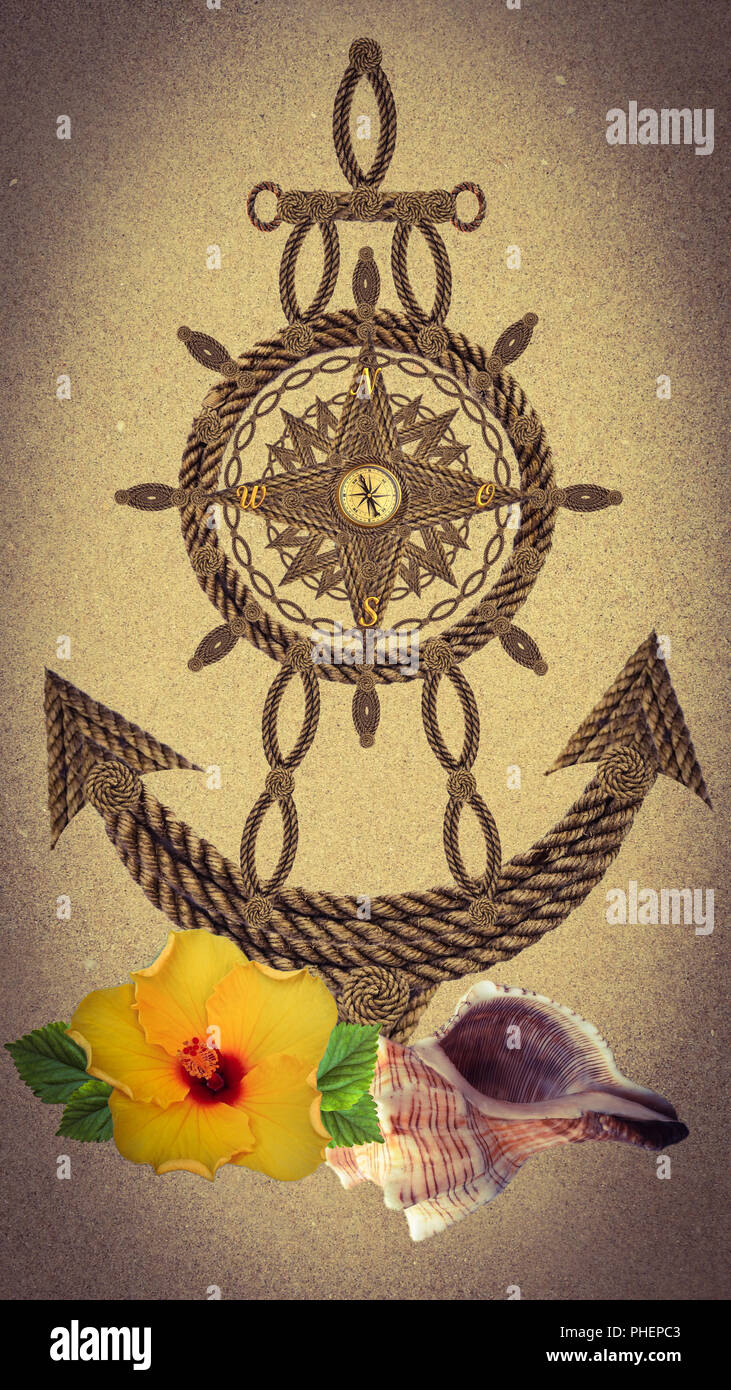 Compass anchor wheel on wood Stock Photo - Alamy