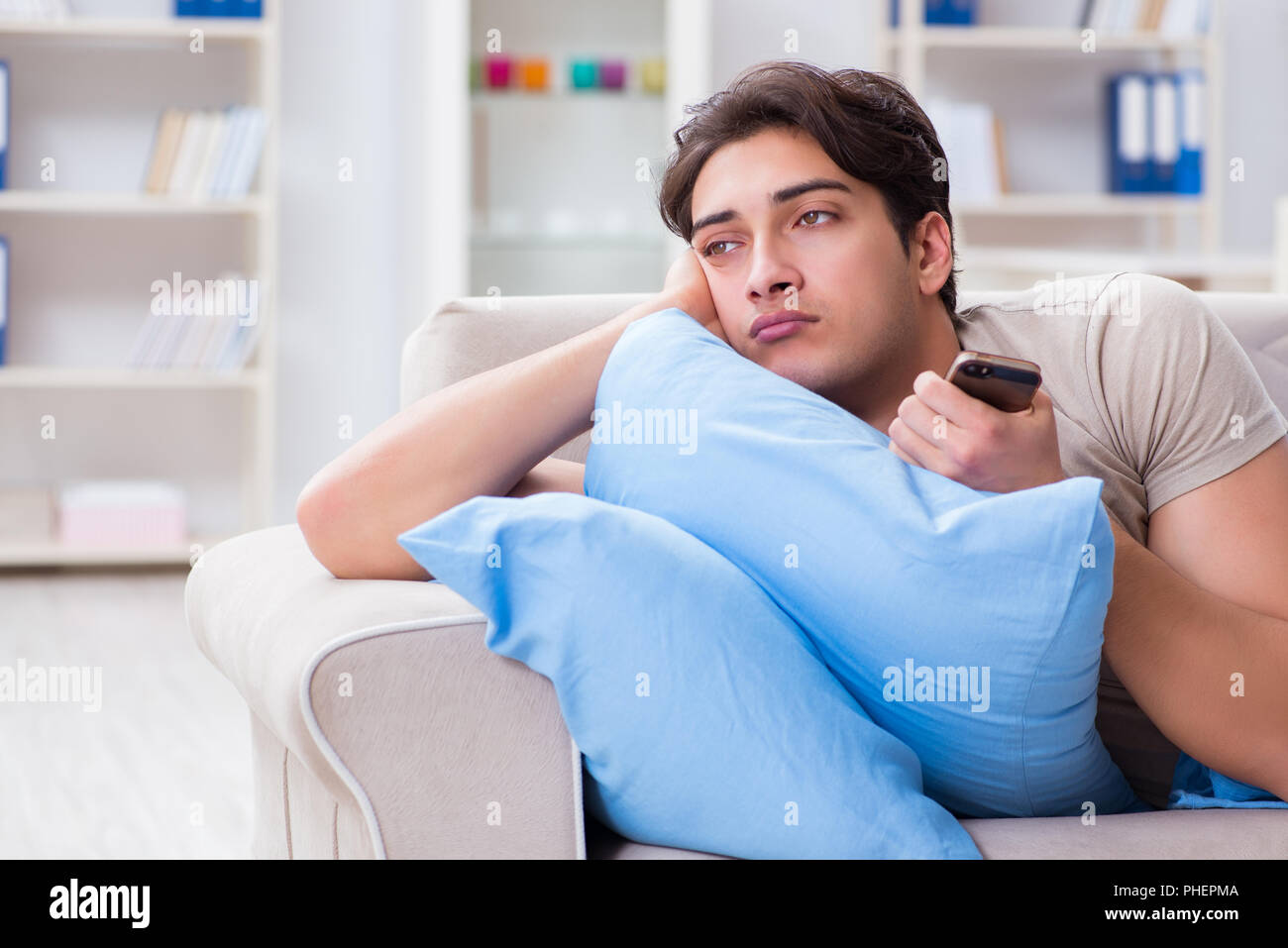 Man addicted to his mobile phone in bed Stock Photo - Alamy