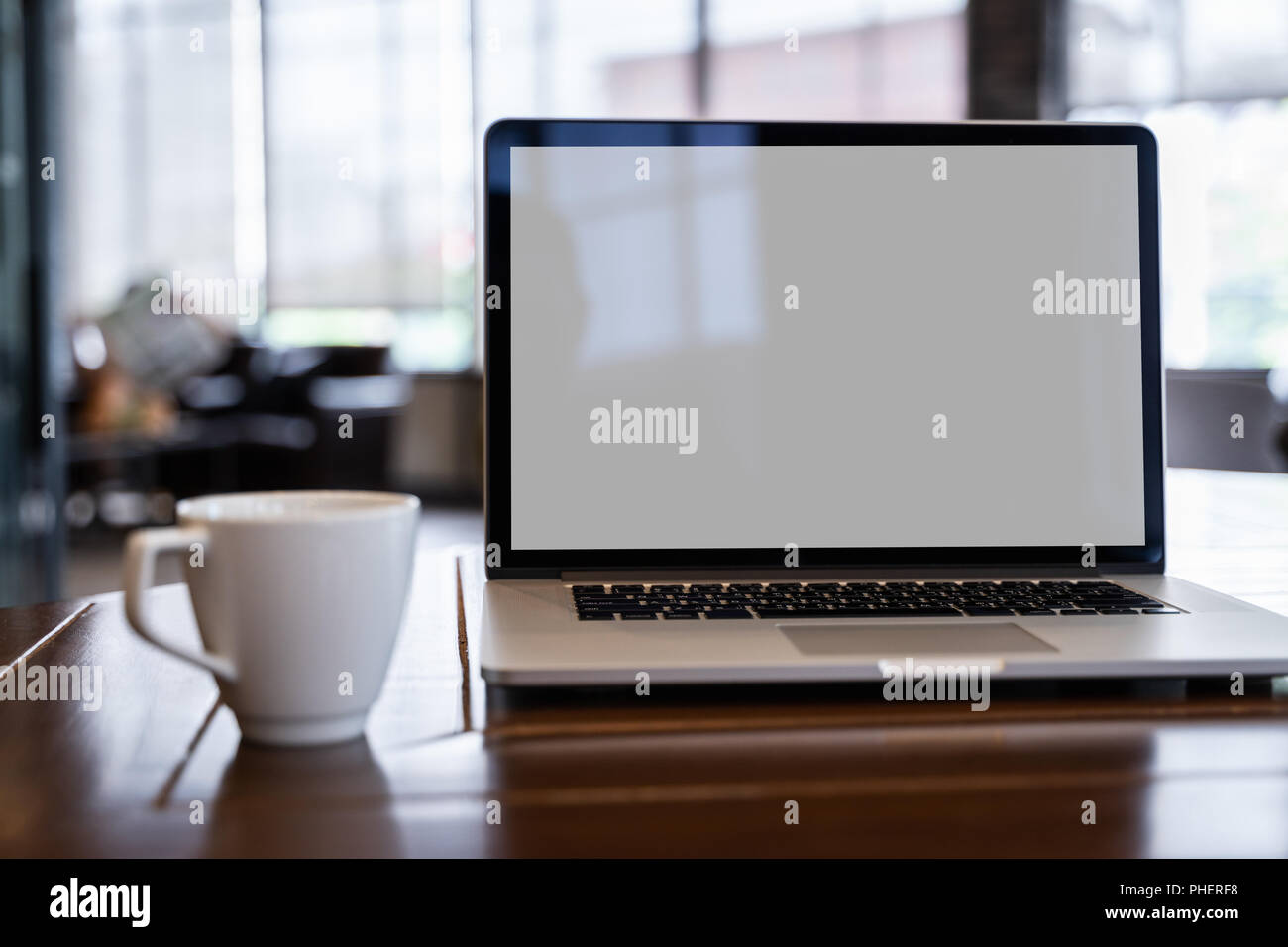 mock up Using laptop with blank screen computer modern Stock Photo - Alamy