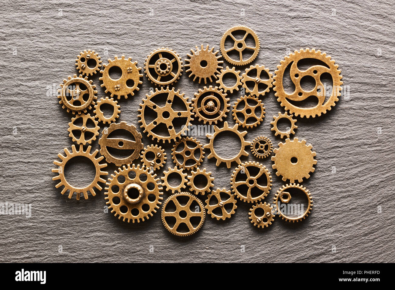 Various metal cogwheels and gear wheels Stock Photo - Alamy