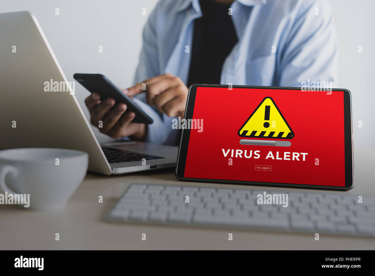 Hacker Protection Concept Man working on laptop Virus Detected Alert ...