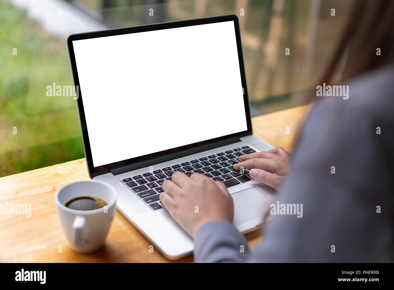 mock up Using laptop with blank screen computer modern Stock Photo - Alamy