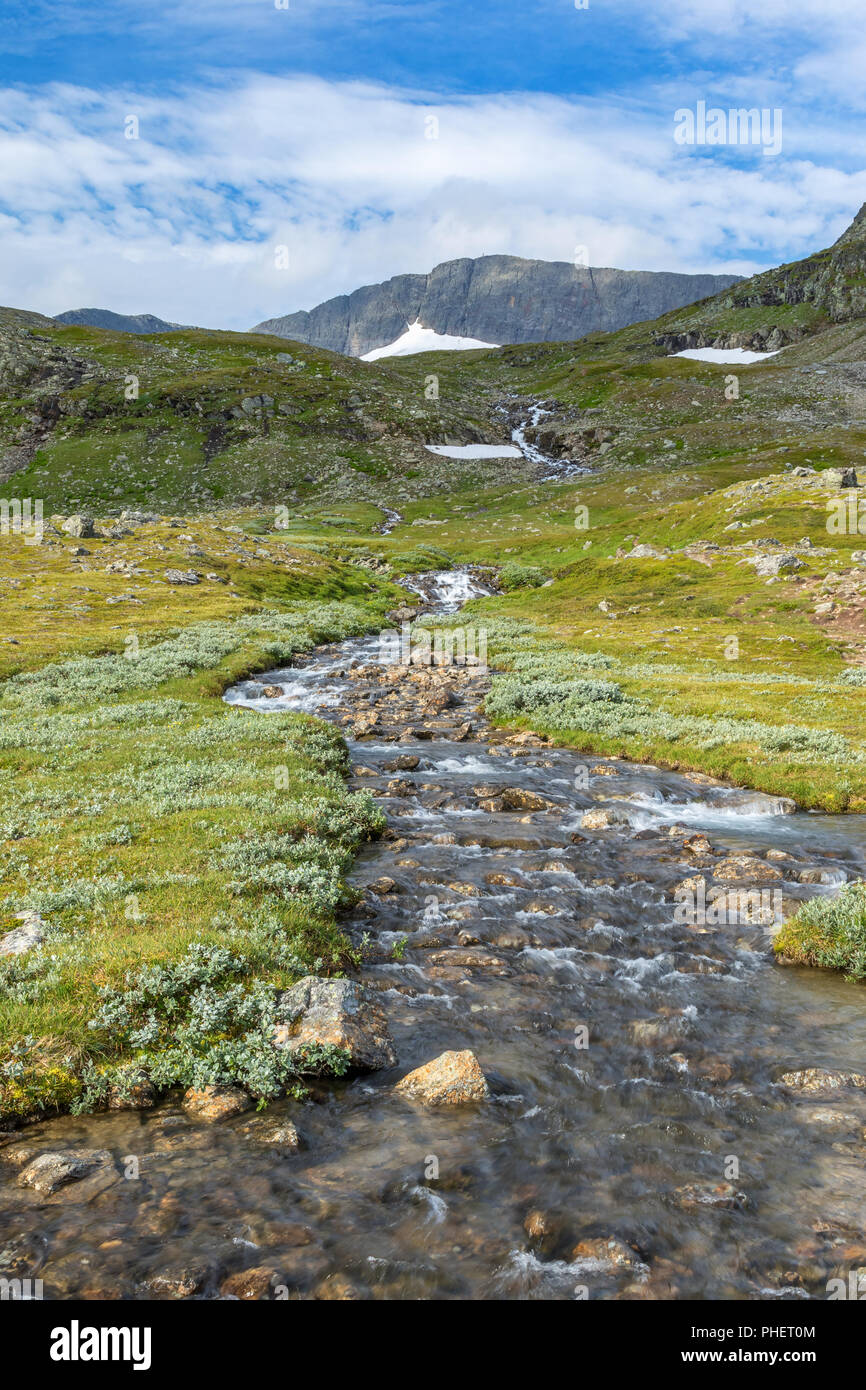 Mountain water stream running in hi-res stock photography and images ...