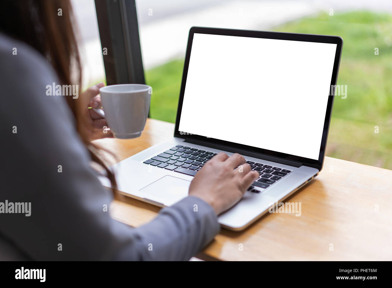 mock up Using laptop with blank screen computer modern Stock Photo - Alamy