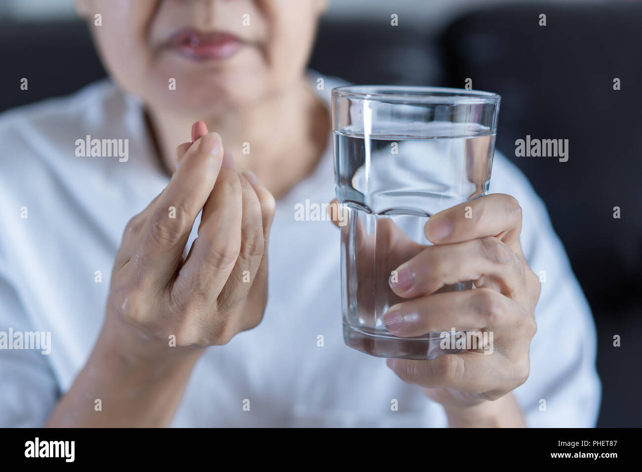 elderly woman eat drug Medicine eating healthy medicine Stock Photo - Alamy