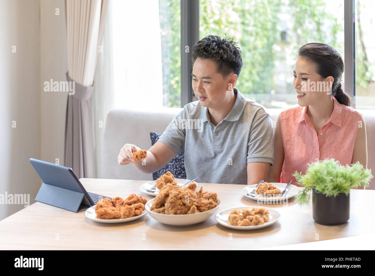 Couples eating together Stock Photo - Alamy