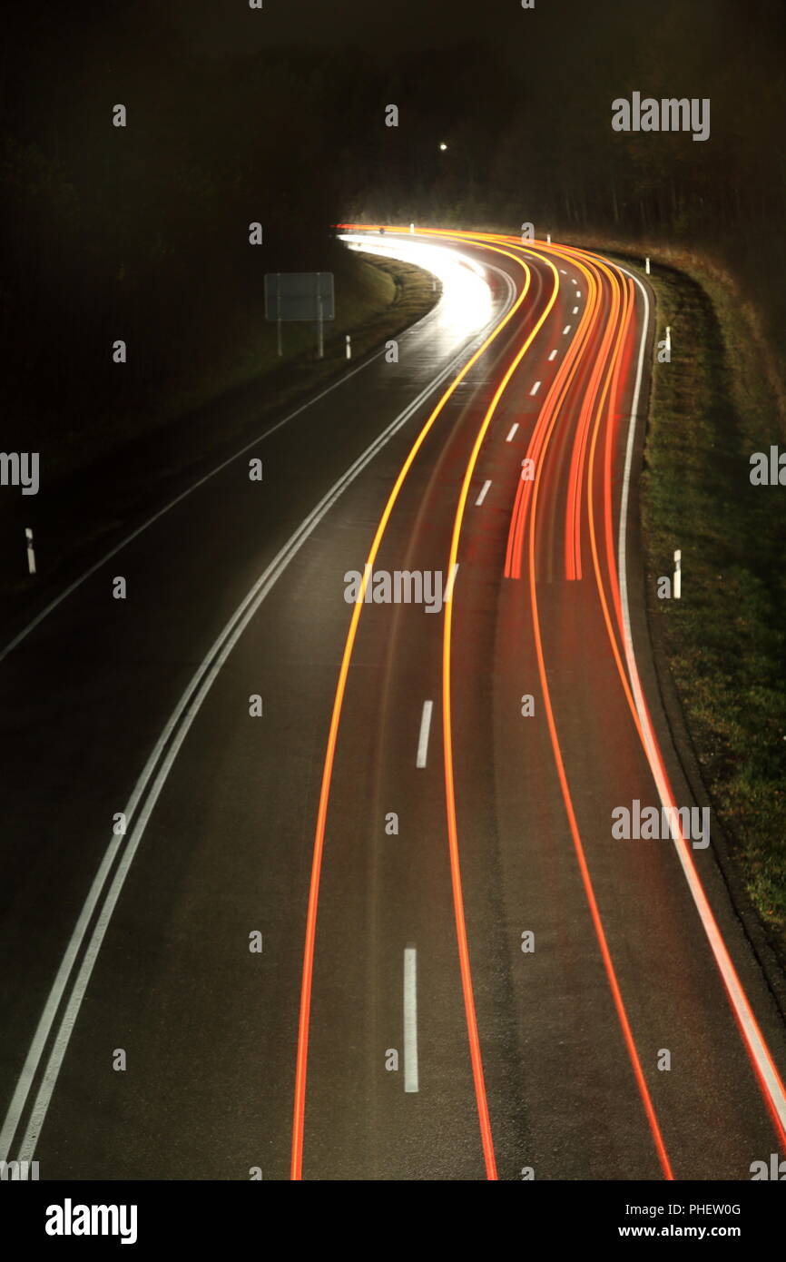 road with lights at night Stock Photo - Alamy