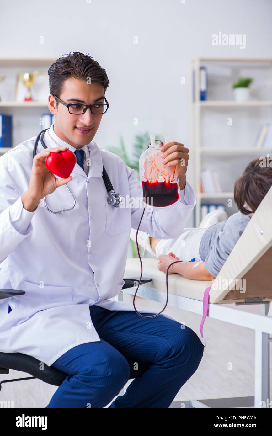 Patient getting blood transfusion in hospital clinic Stock Photo - Alamy