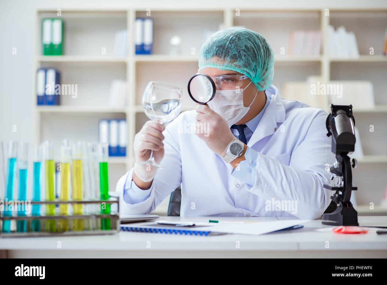 Forensics investigator working in lab on crime evidence Stock Photo - Alamy