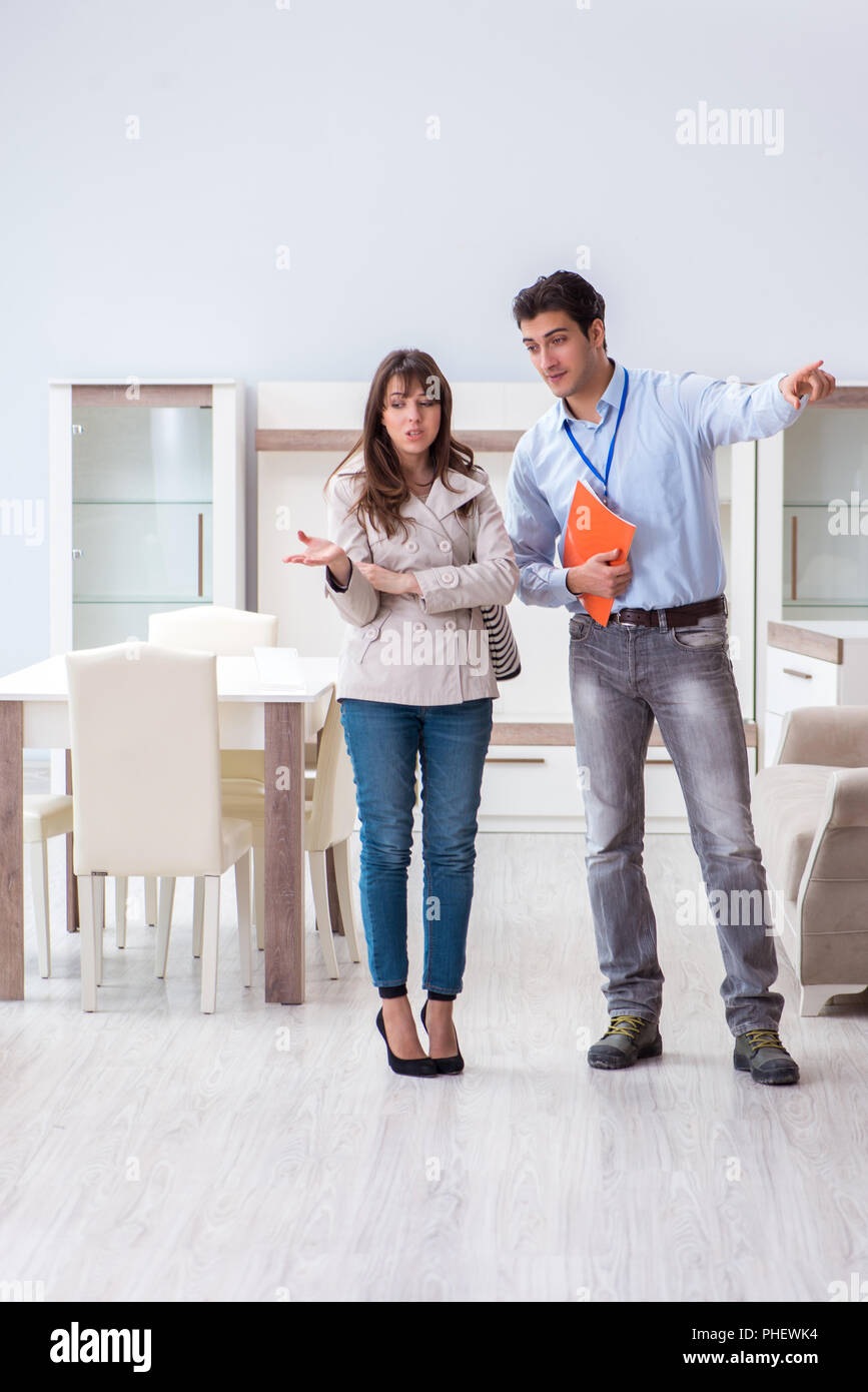Salesman explaining woman customer hi-res stock photography and images ...