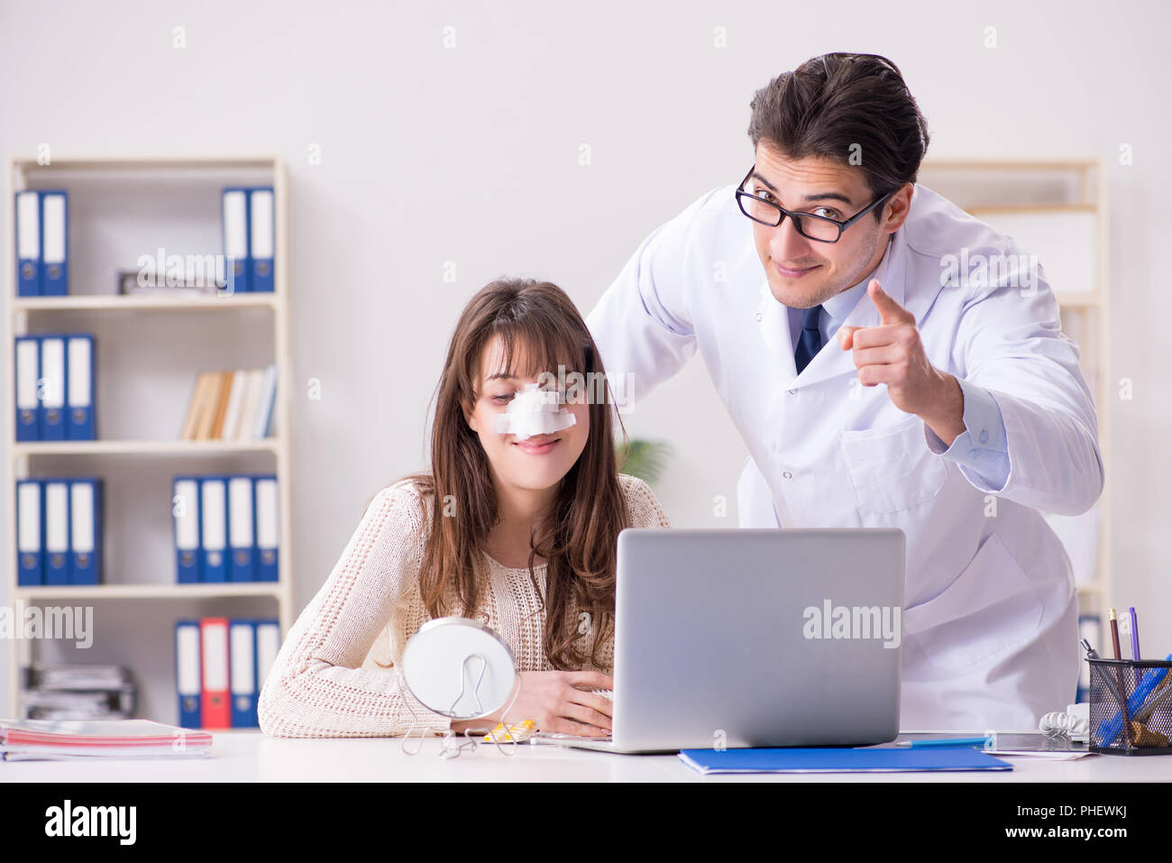 Male doctor talking to patient with nose operation surgery Stock Photo ...