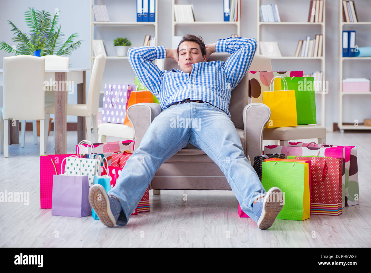 Shopping excessive hi-res stock photography and images - Alamy