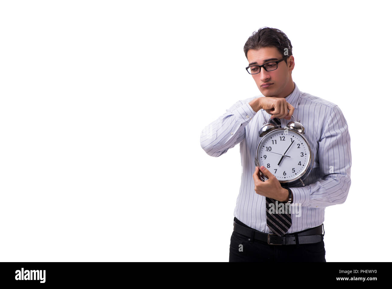 Young businessman in time management concept on white background Stock ...