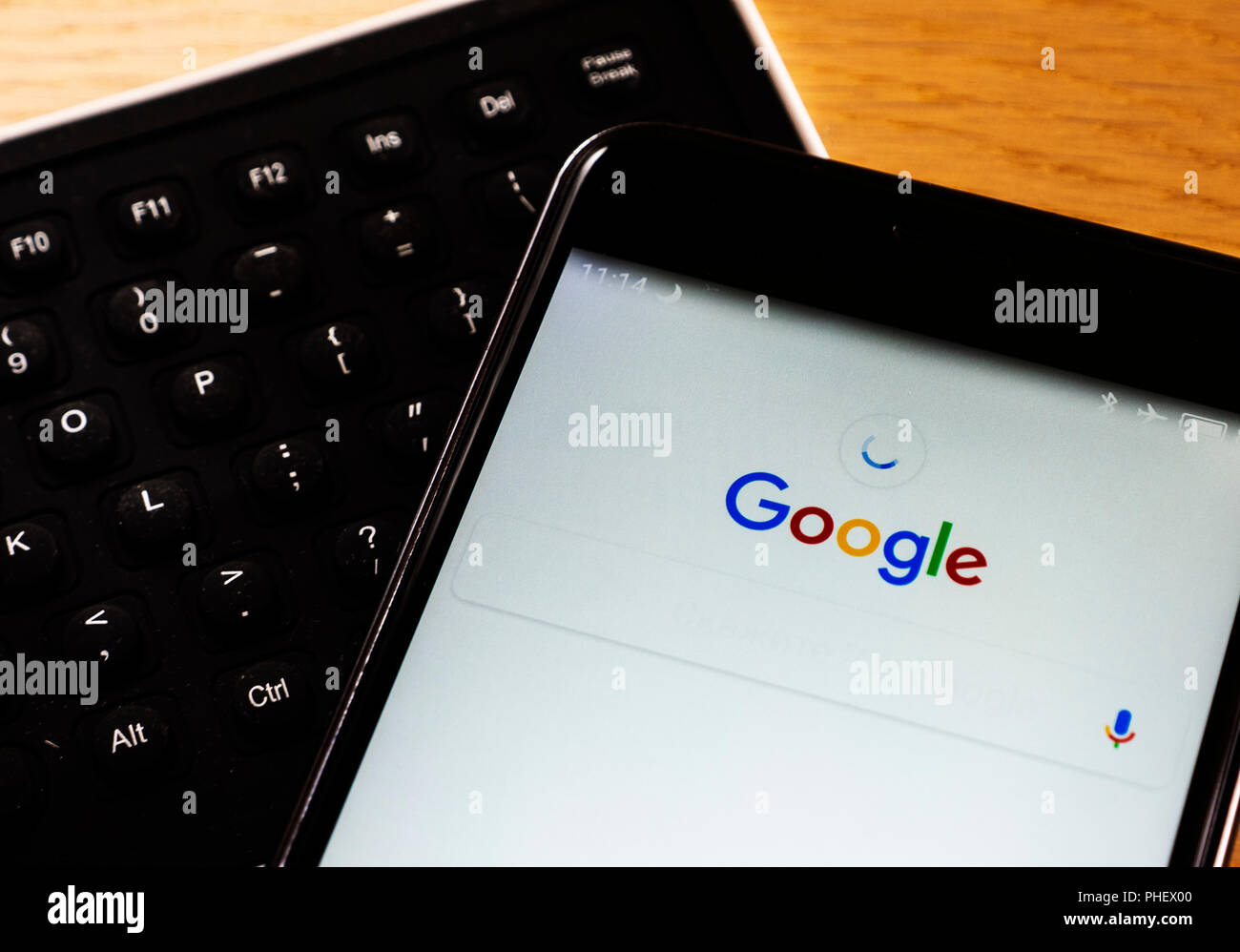 The Google logo seen displayed on a smart phone Stock Photo - Alamy