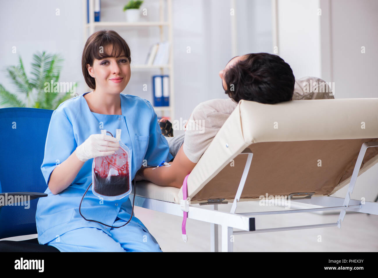 Patient getting blood transfusion in hospital clinic Stock Photo - Alamy