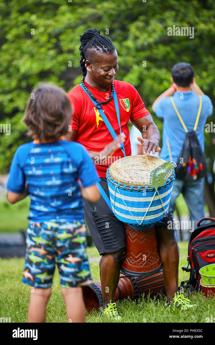 Playing bongo hi-res stock photography and images - Alamy