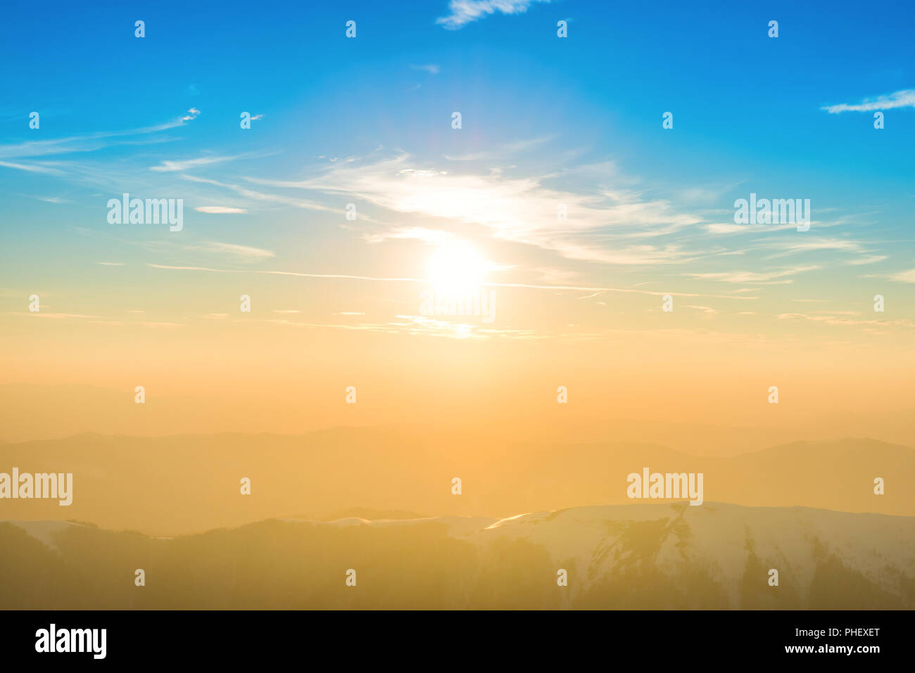 Beautiful sunset over snowy mountains hi-res stock photography and ...