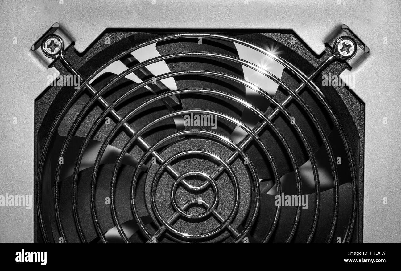 Cooling fan behind the grille Stock Photo - Alamy
