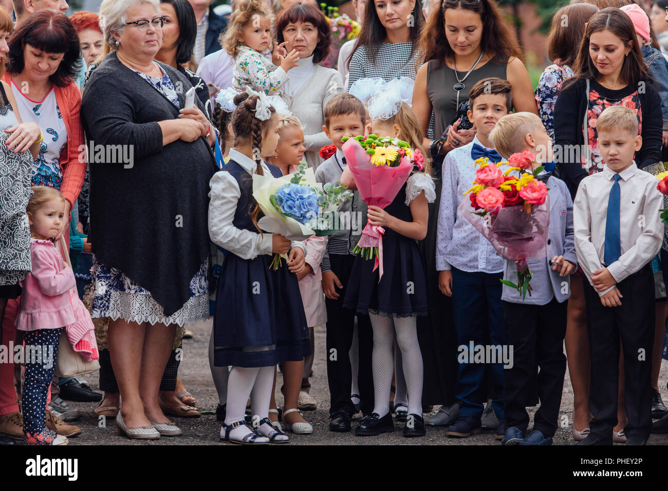 Happy teacher meeting parents hi-res stock photography and images - Alamy