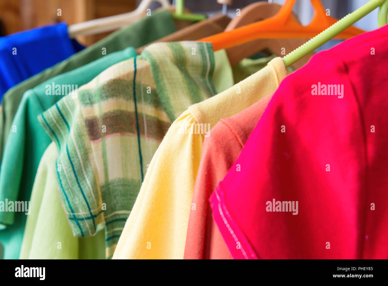 Many colorful shirts Stock Photo - Alamy