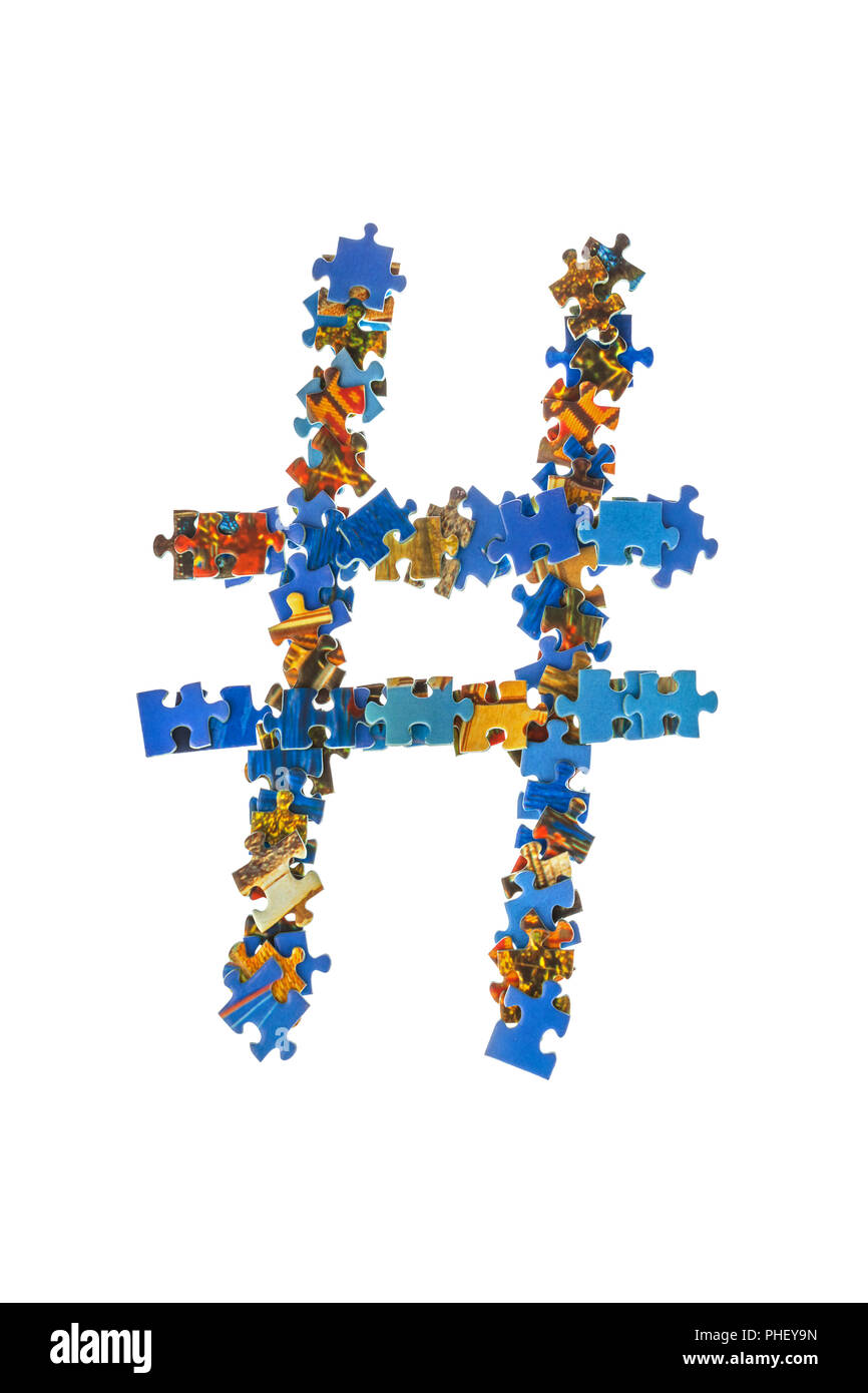 Symbol # made of puzzle pieces Stock Photo - Alamy