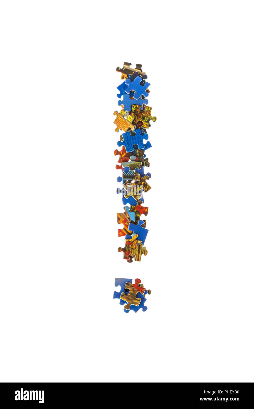 Symbol ! made of puzzle pieces Stock Photo - Alamy