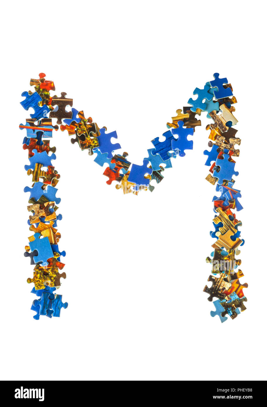 Letter M made of puzzle pieces Stock Photo - Alamy