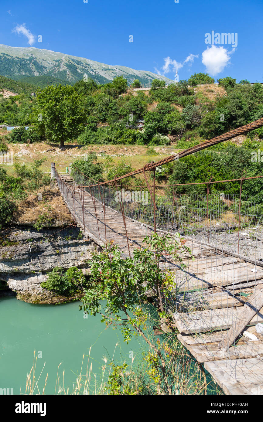 View of the old, destroyed bridge over the river Viosa, south Albania ...