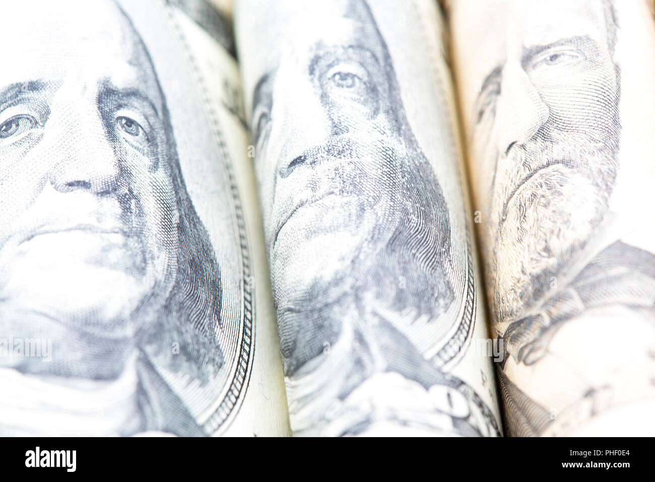 blurred dollars banknote rolled up and close up concept of economy ...