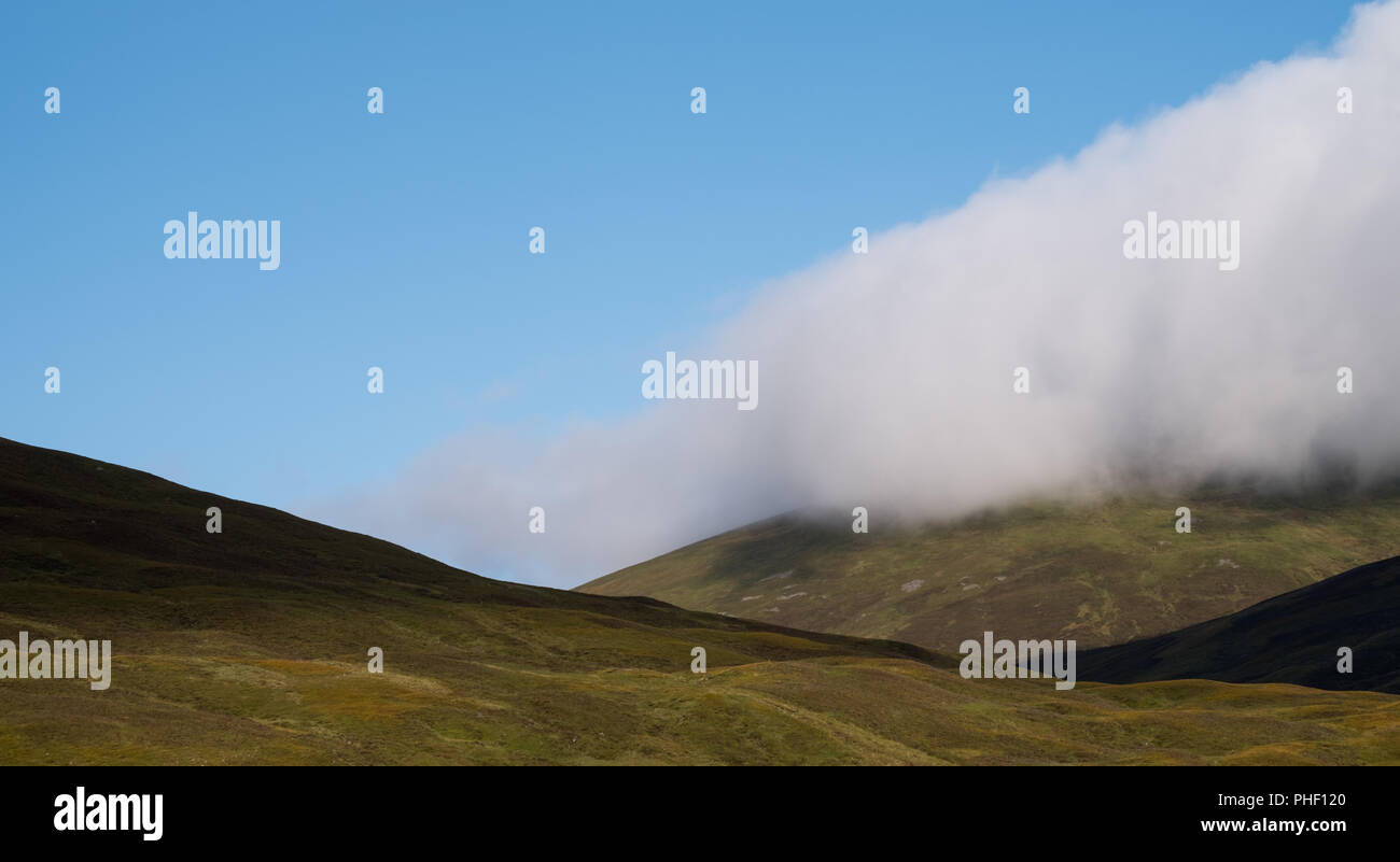 View of hills in Scottish Highlands on a clear summer's day, with low ...