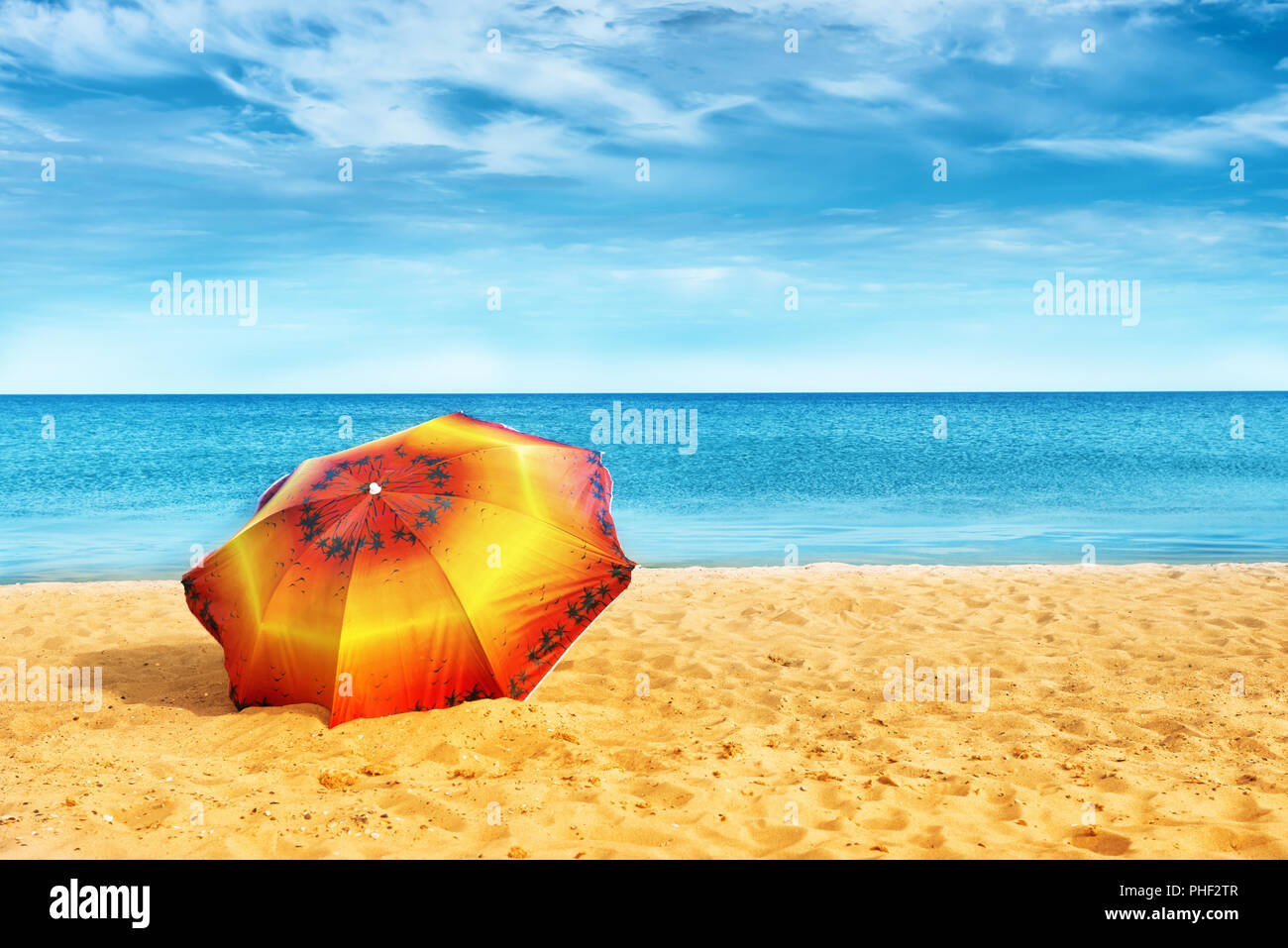 Sand beach umbrella hi-res stock photography and images - Alamy