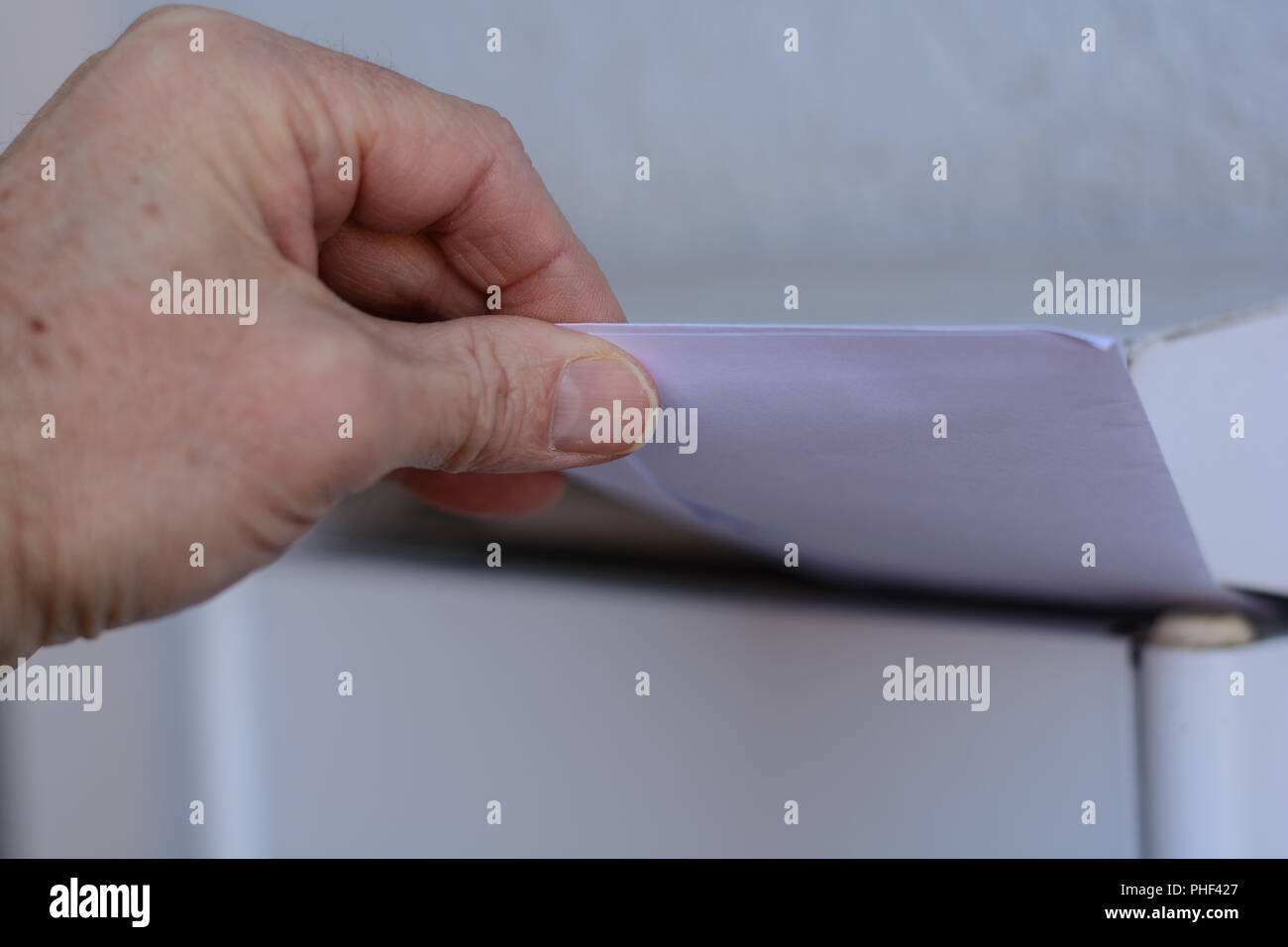Hand in letterbox hi-res stock photography and images - Alamy