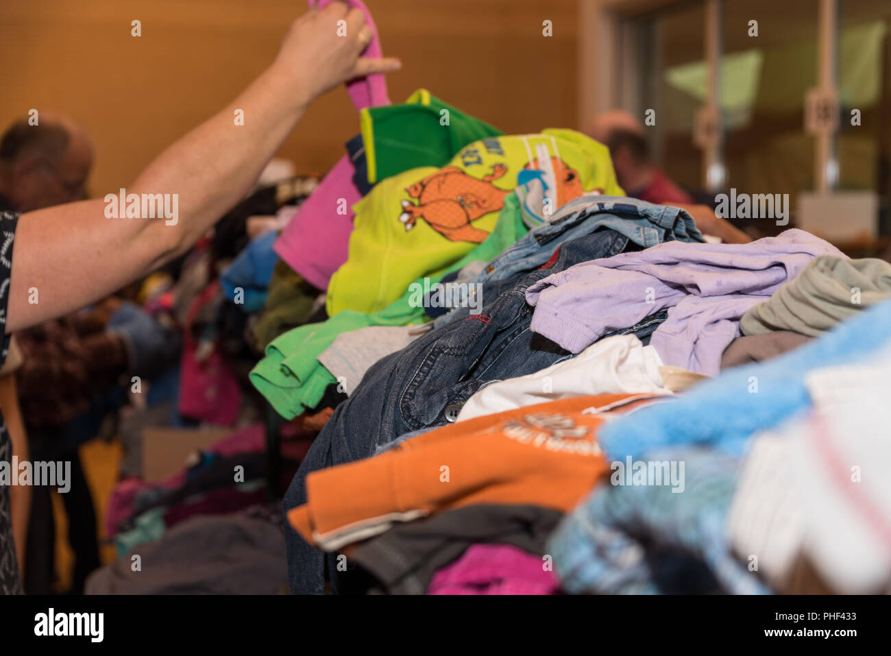 Rummaging hi-res stock photography and images - Alamy