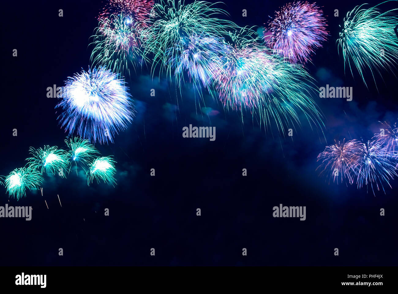 Colorful blue holiday fireworks Stock Photo - Alamy