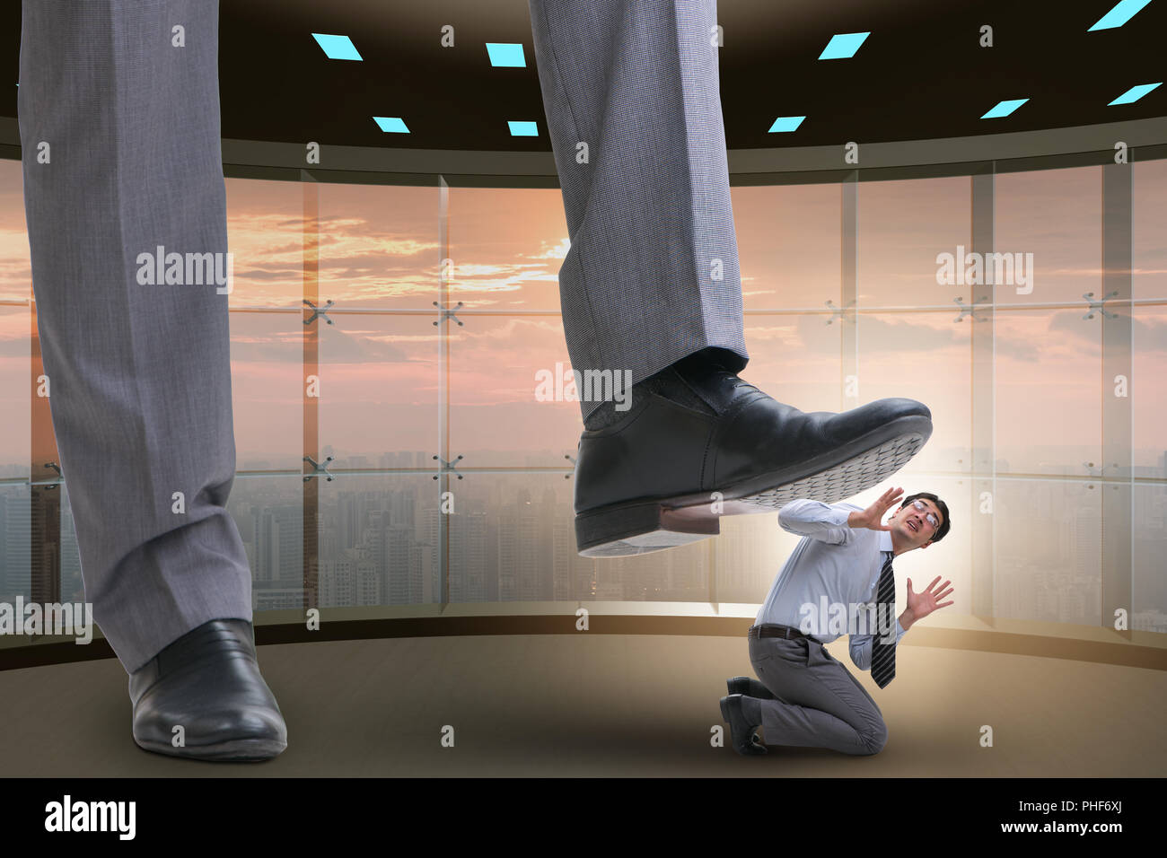 Bad angry boss stamping on employee in business concept Stock Photo - Alamy